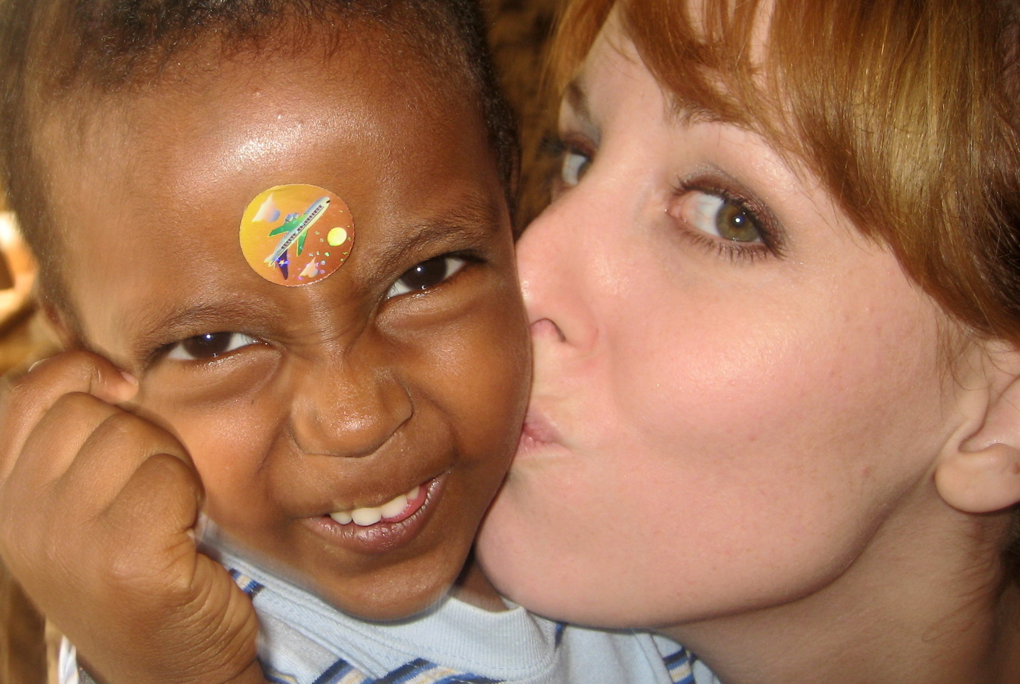 sloniger kissing - The Sparrow Fund